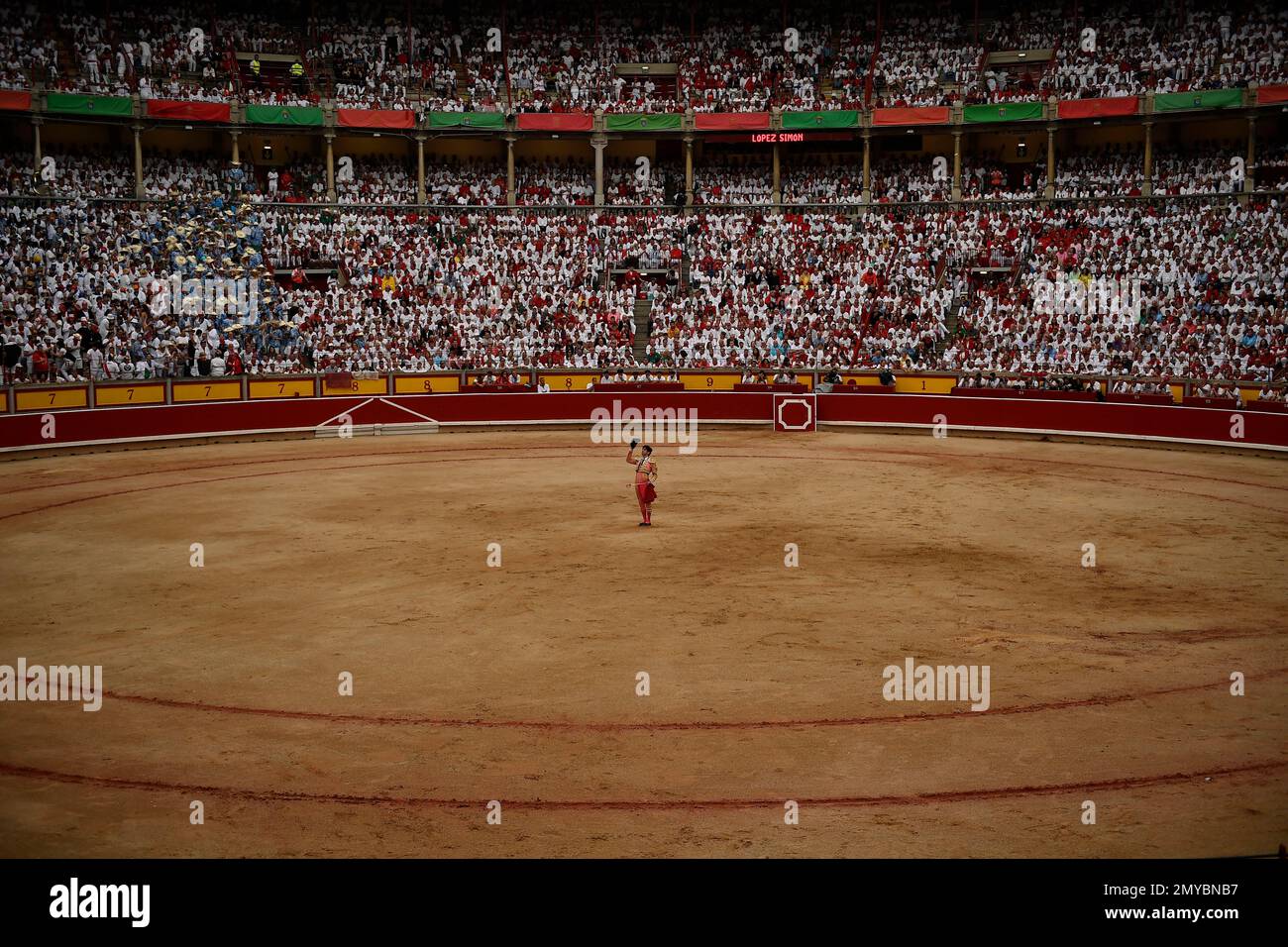 Spanish bullfighter Lopez Simon removes his hat prior to his ...