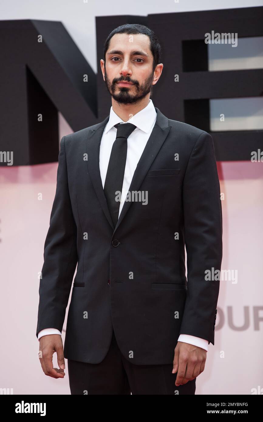 English actor Riz Ahmed poses for photographers upon arrival at the ...