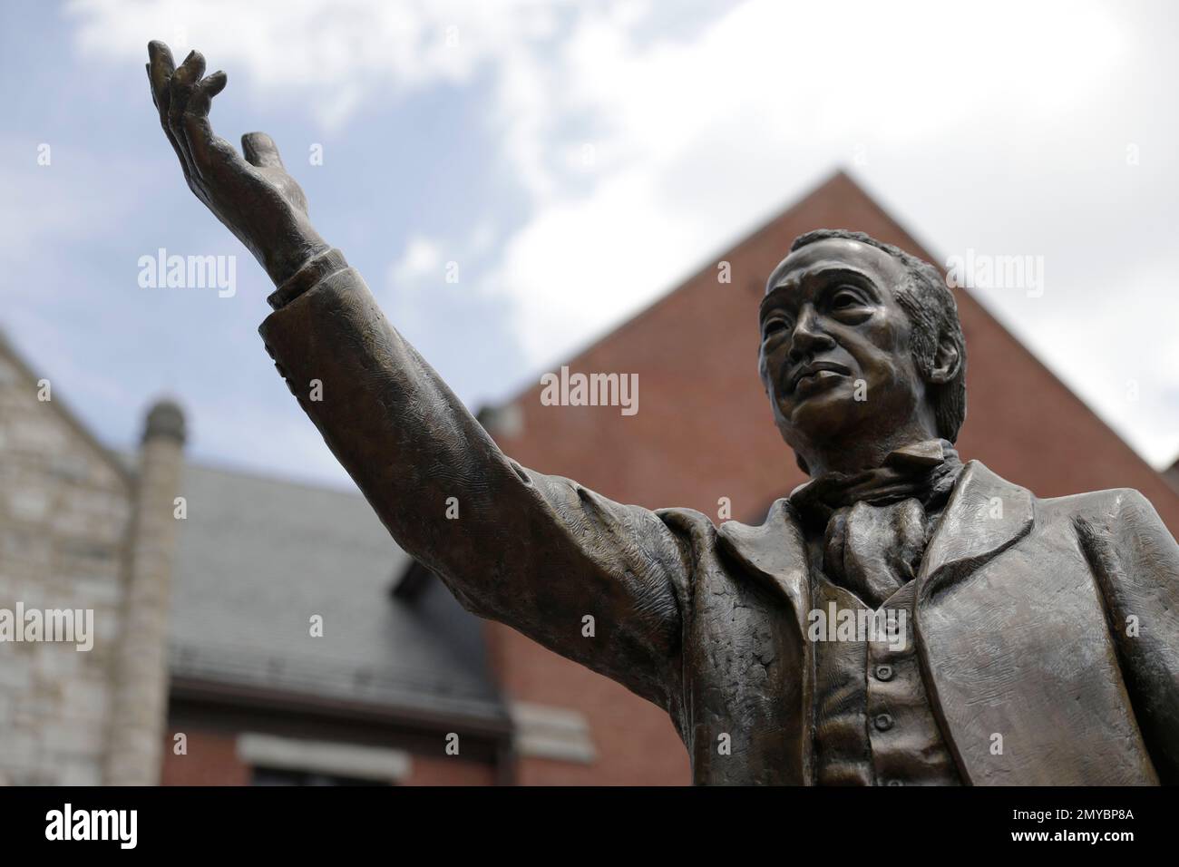 A sculpture depicting Bishop Richard Allen stands in front of Mother ...