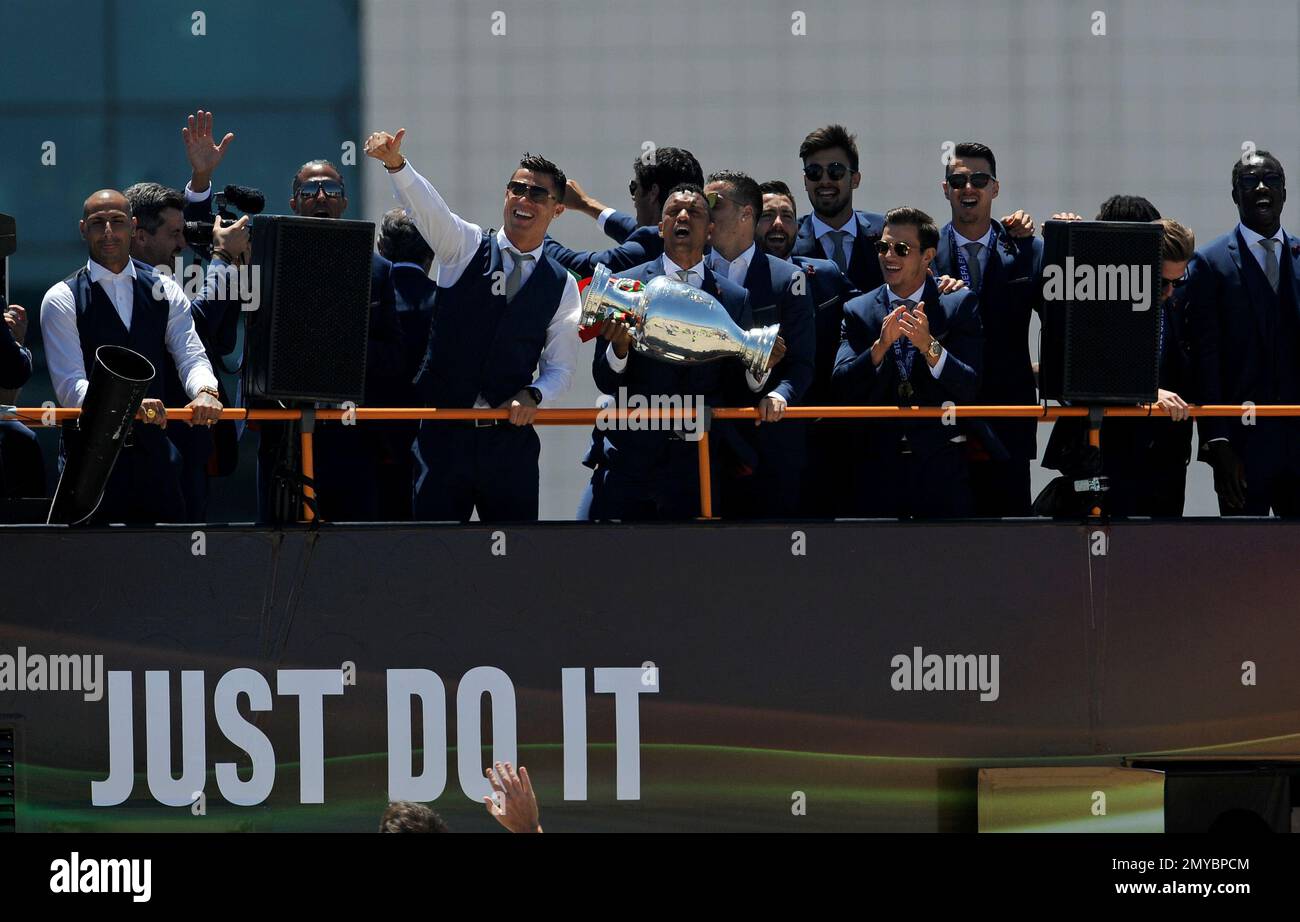 Portugal's Nani lifts the Euro 2016 trophy after defeating France in ...