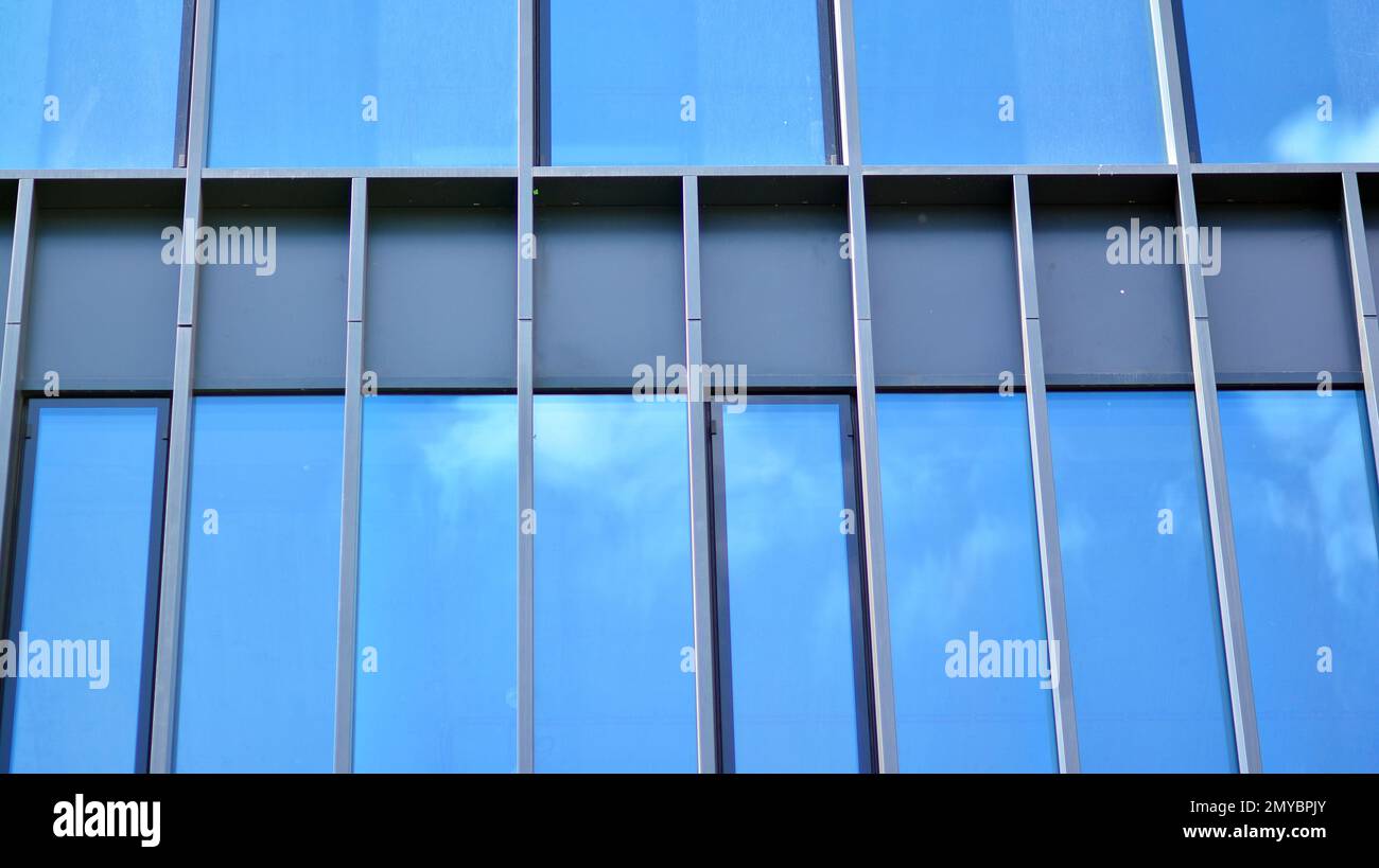 Abstract fragment of contemporary architecture, walls made of glass and ...