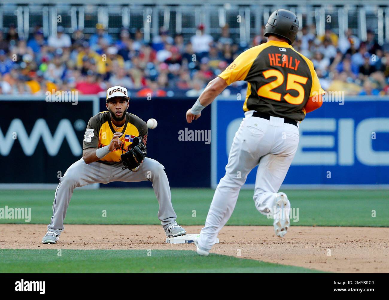U.S. Team's Ryon Healy (25), of the Oakland Athletics, is forced out by ...