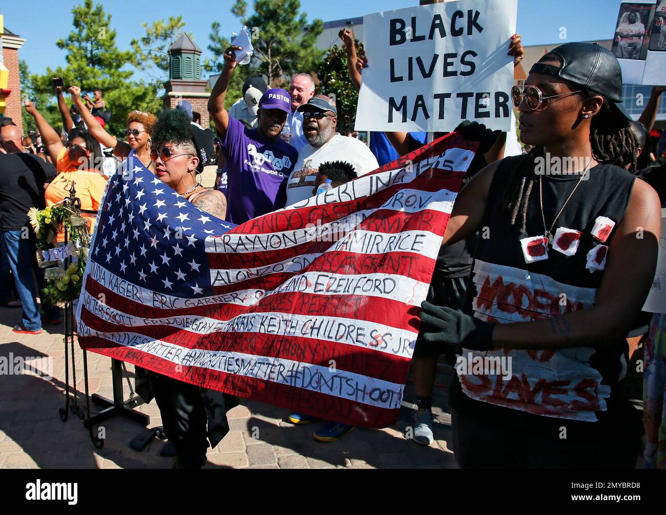 April Watts, left, and Tyler Watts, right, of Oklahoma City, hold a ...