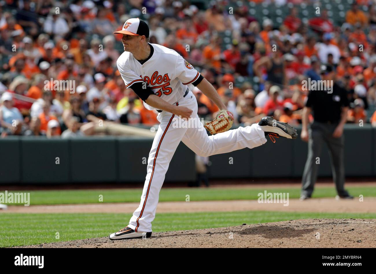 Baltimore Orioles relief pitcher Brad Brach follows through on a pitch ...