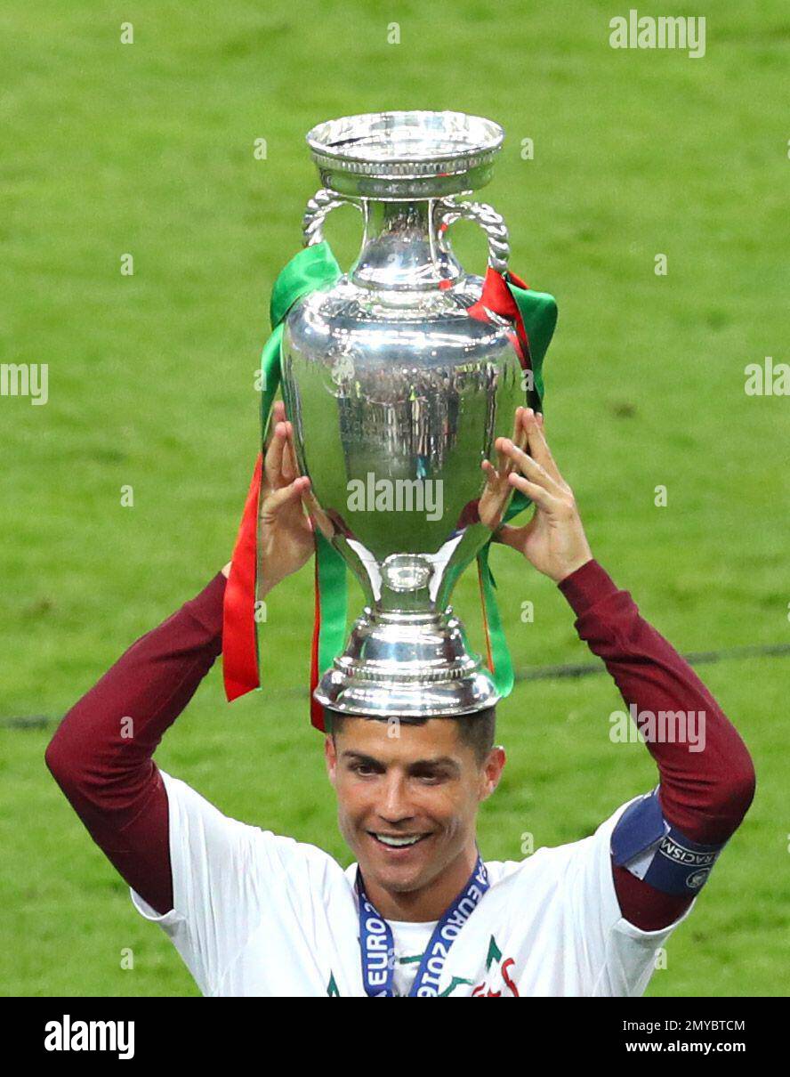 Portugal's Cristiano Ronaldo celebrates with the trophy after winning ...