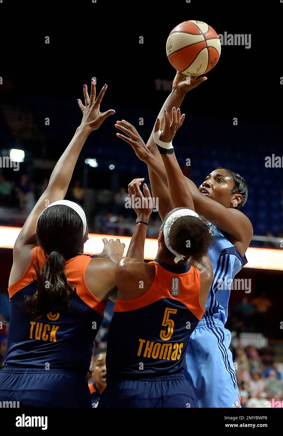 Atlanta Dream's Angel McCoughtry, right, shoots over Connecticut Sun's ...