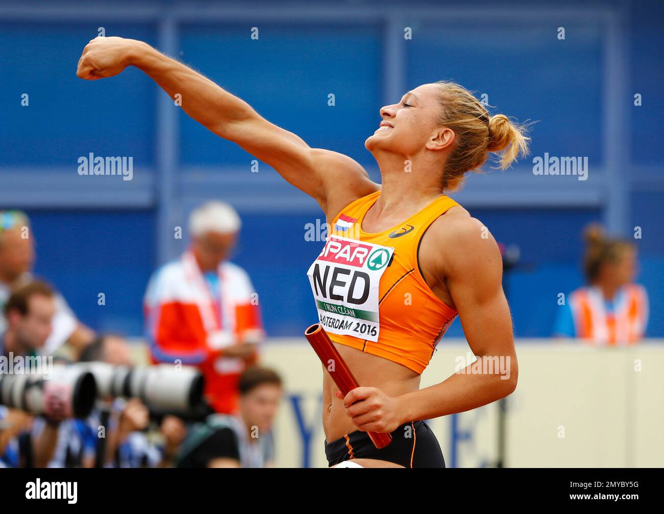 Netherlands' Naomi Sedney celebrates after crossing the line as the ...
