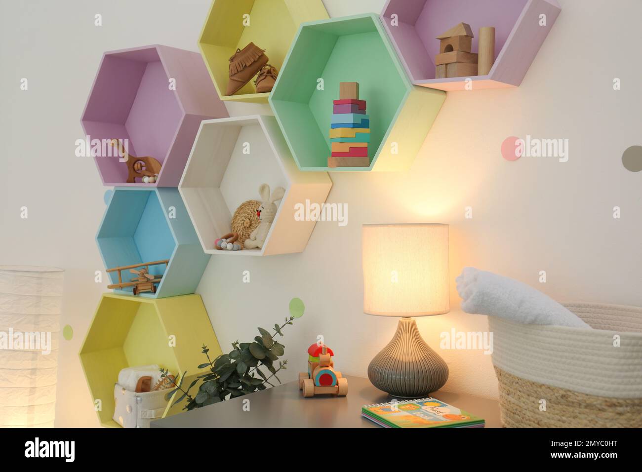 Bright colorful shelves on light wall in room. Interior design Stock ...