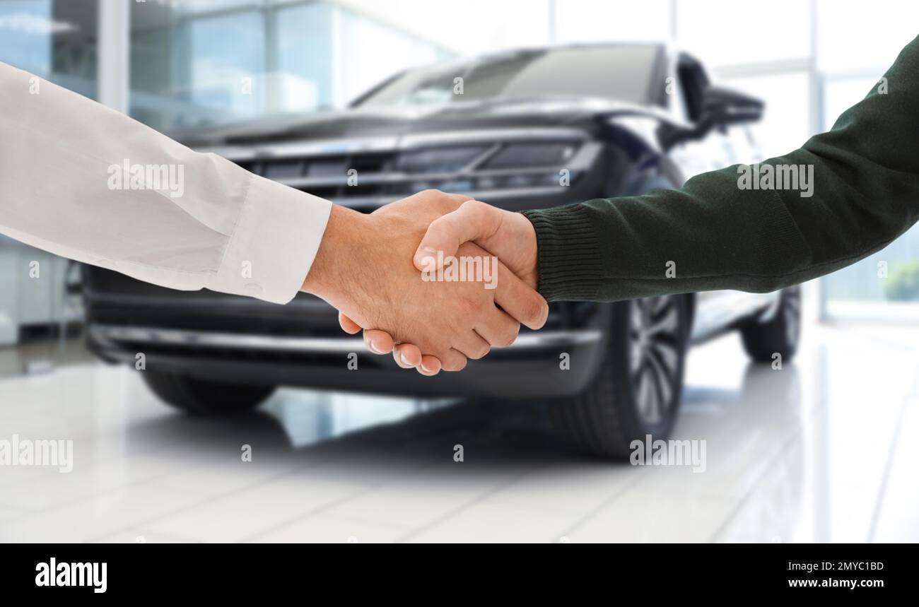 Hands black car salesman hi-res stock photography and images - Alamy