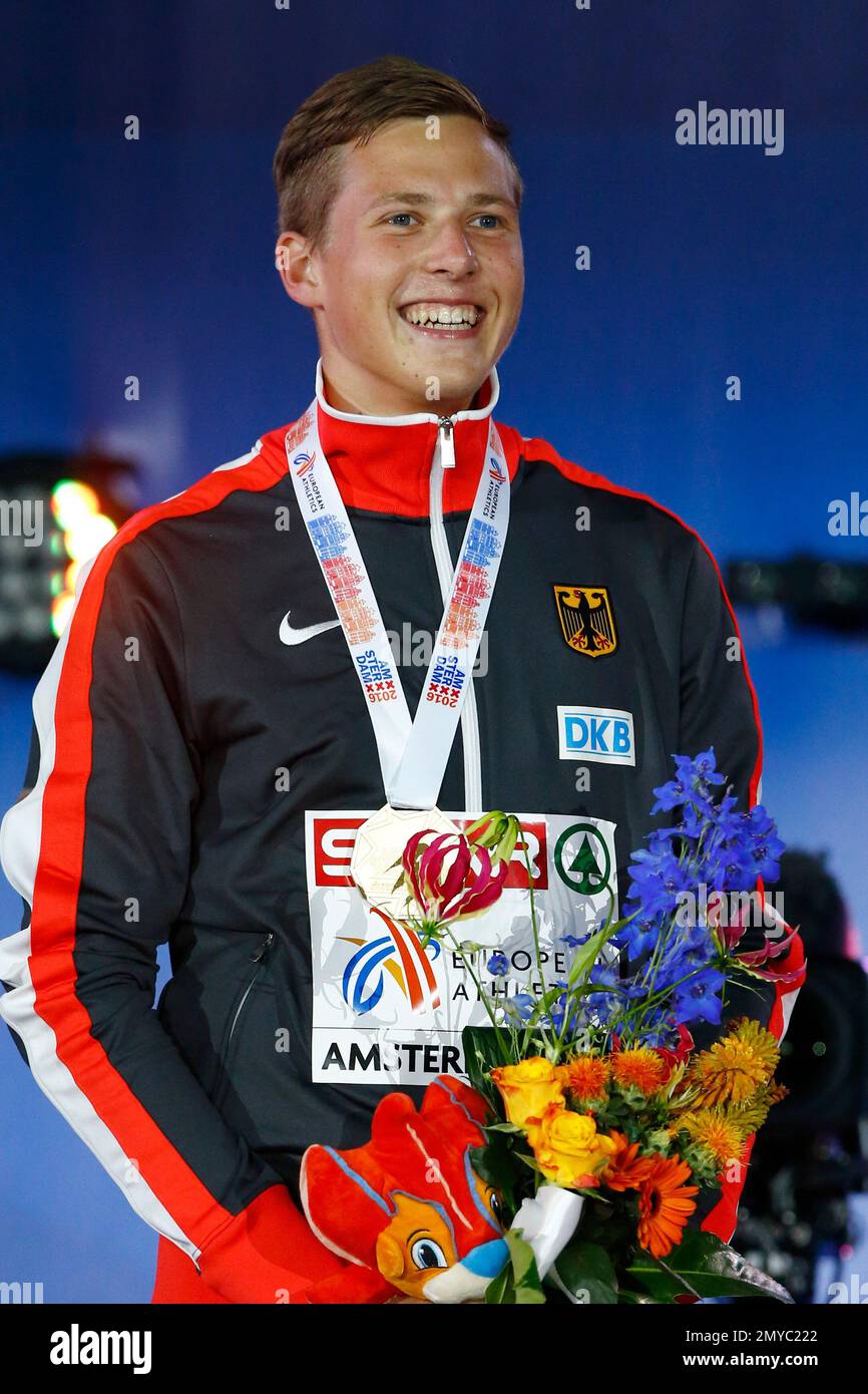 Germany's gold medal winner Max Hess celebrates on the podium after ...