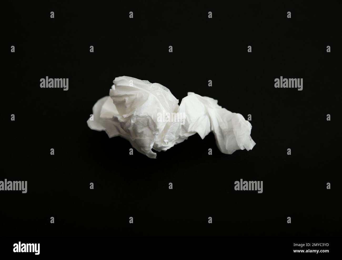 Used white paper tissue on black background Stock Photo - Alamy
