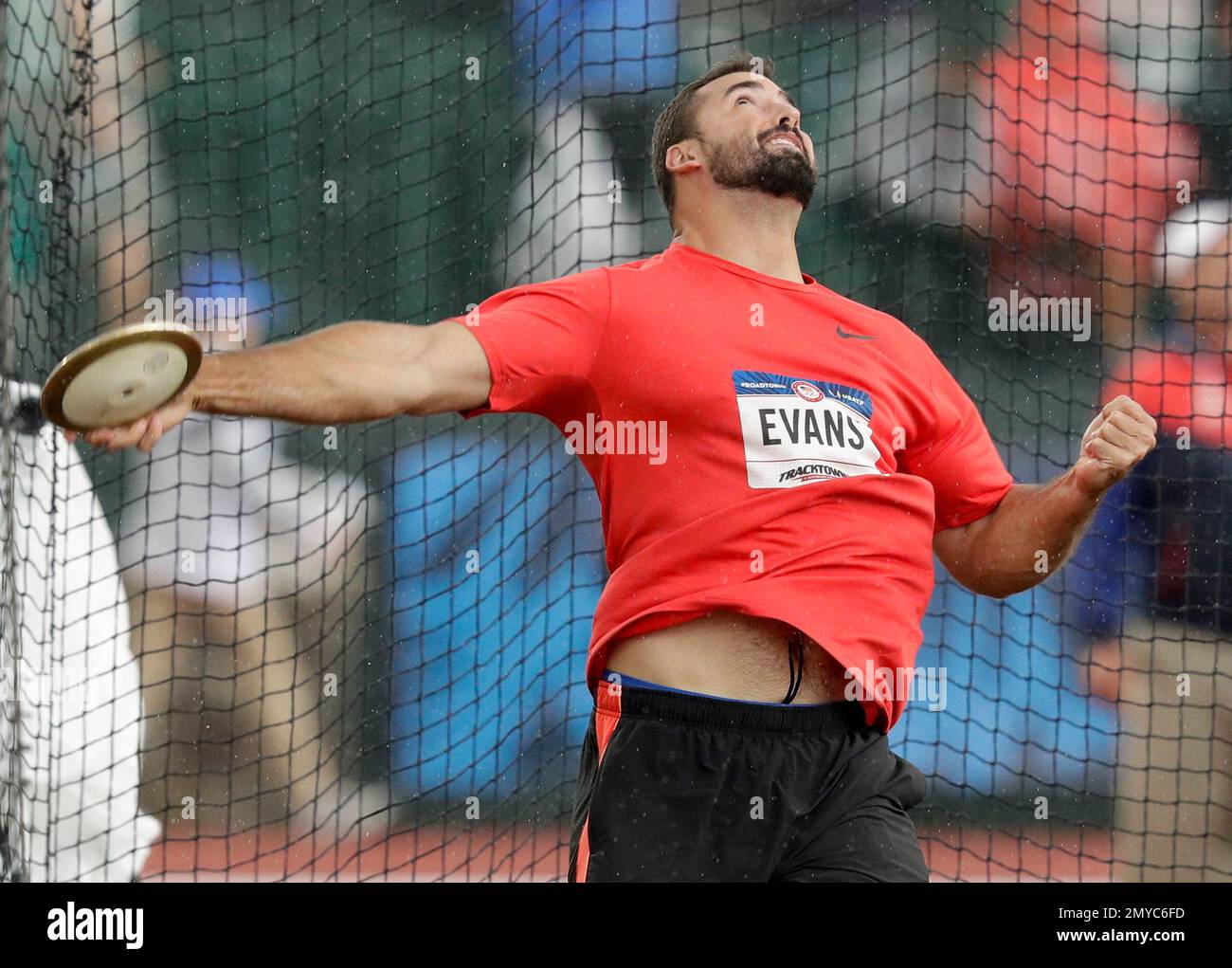 Andrew Evans competes during the men’s discus throw final at the U.S ...