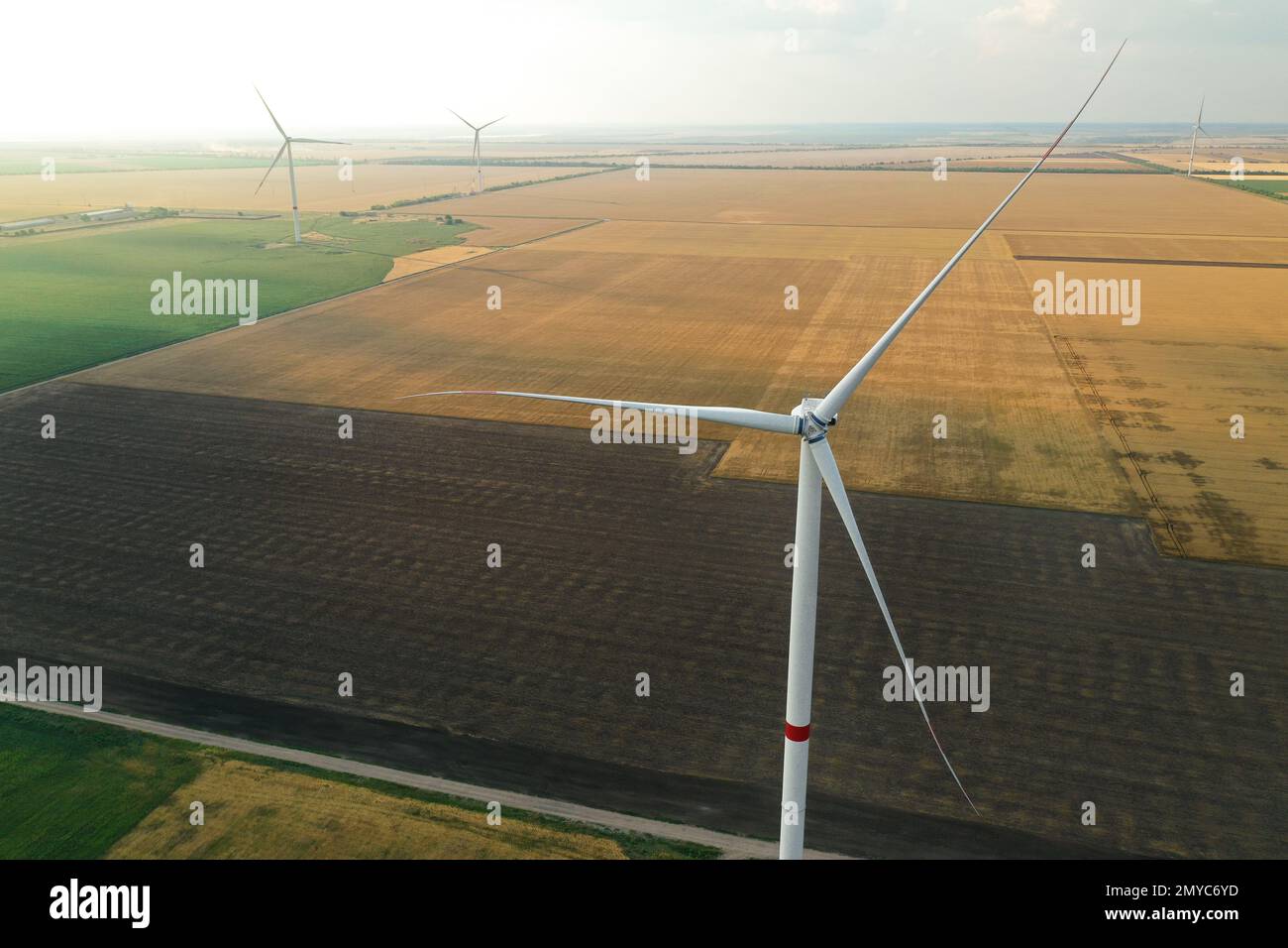 Windmill in fresh green field hi-res stock photography and images - Alamy