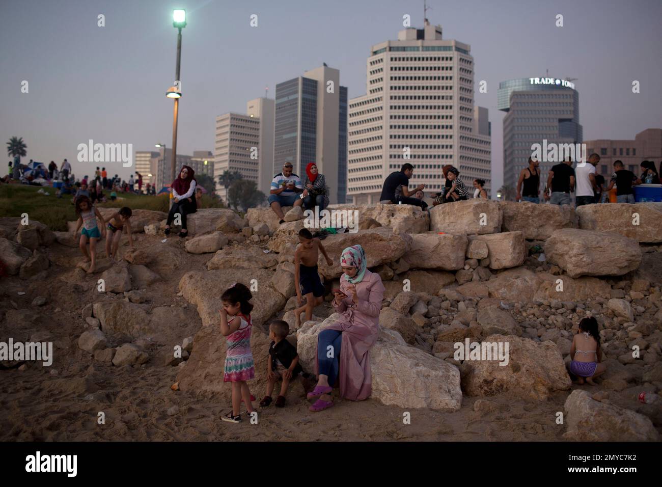 Israeli Arabs enjoy the Mediterranean sea during the Eid al-Fitr ...