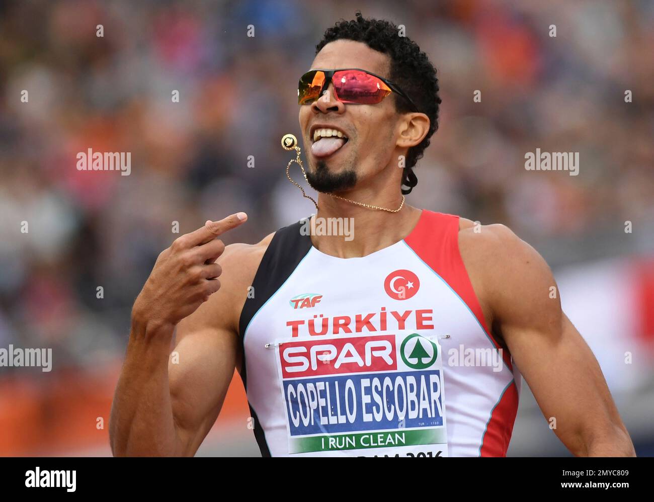 Turkey's Yasmani Copello Escobar celebrates after winning the gold ...