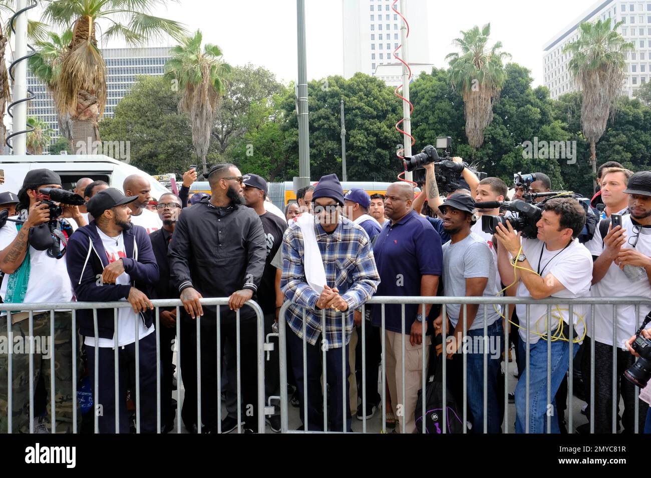 Rappers The Game, third from left, and Snoop Dogg, center, lead a march ...