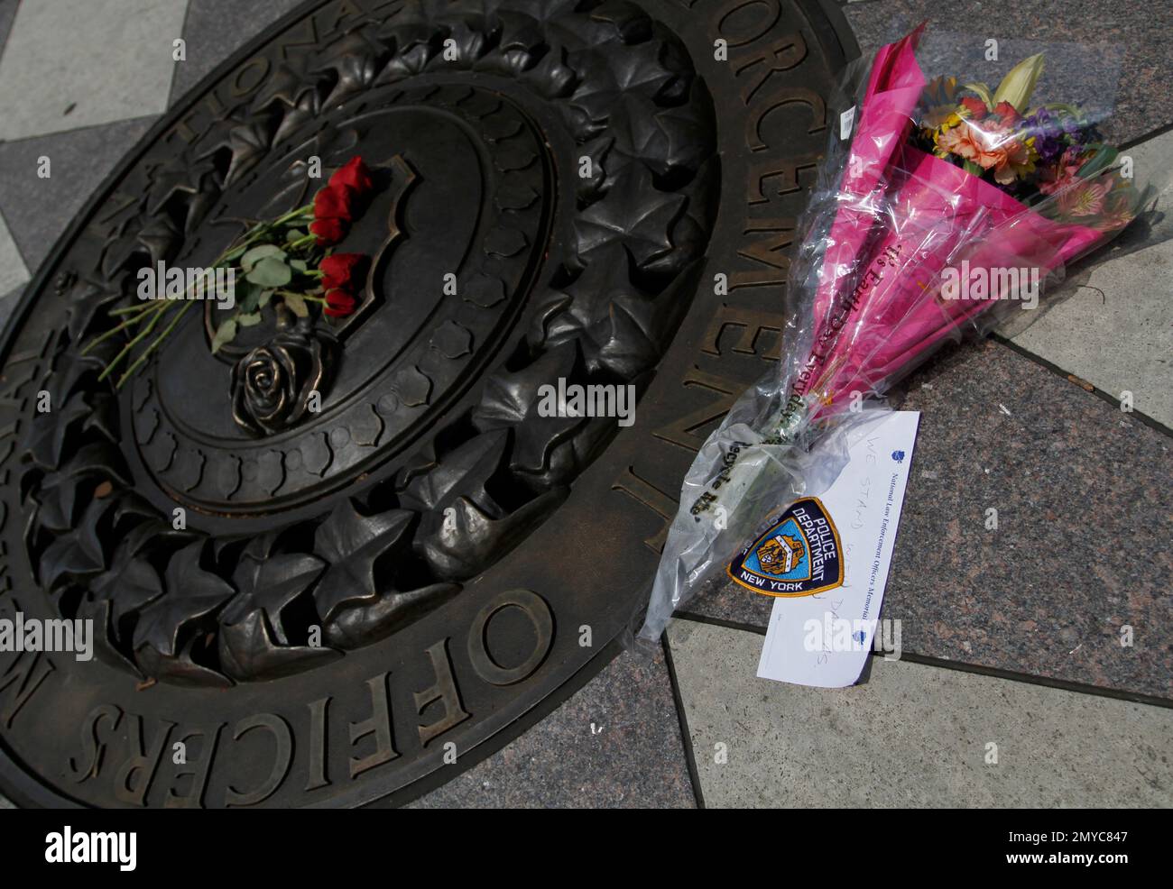 Five red roses, a bouquet of flowers and a note of support for the ...