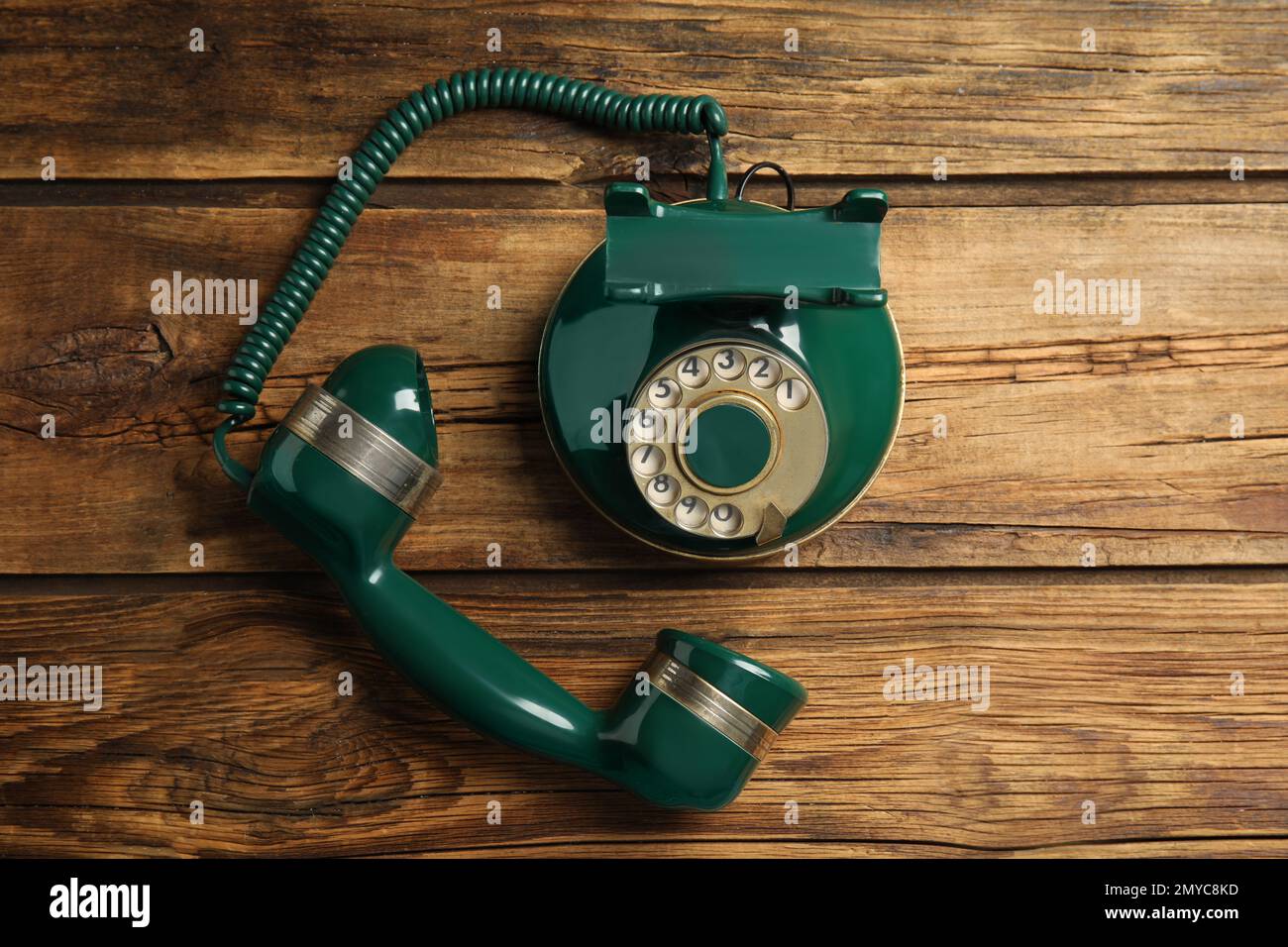 Vintage corded phone on wooden table, top view Stock Photo - Alamy