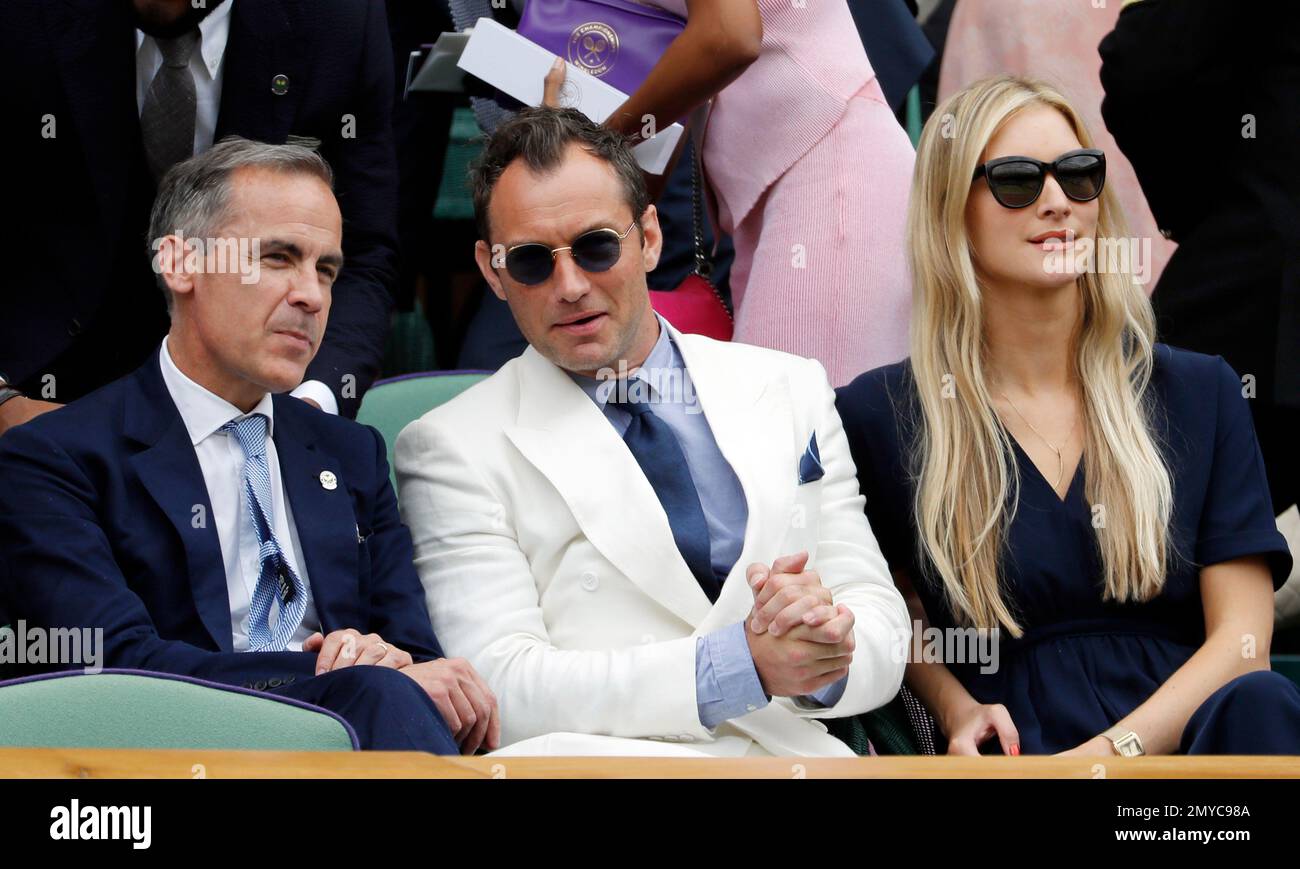 From left, Governor of the Bank of England Mark Carney, actor Jude Law ...