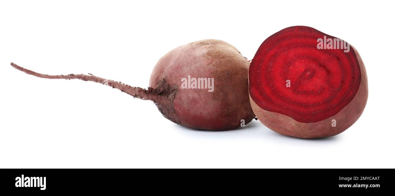 Whole and cut red beets on white background Stock Photo - Alamy