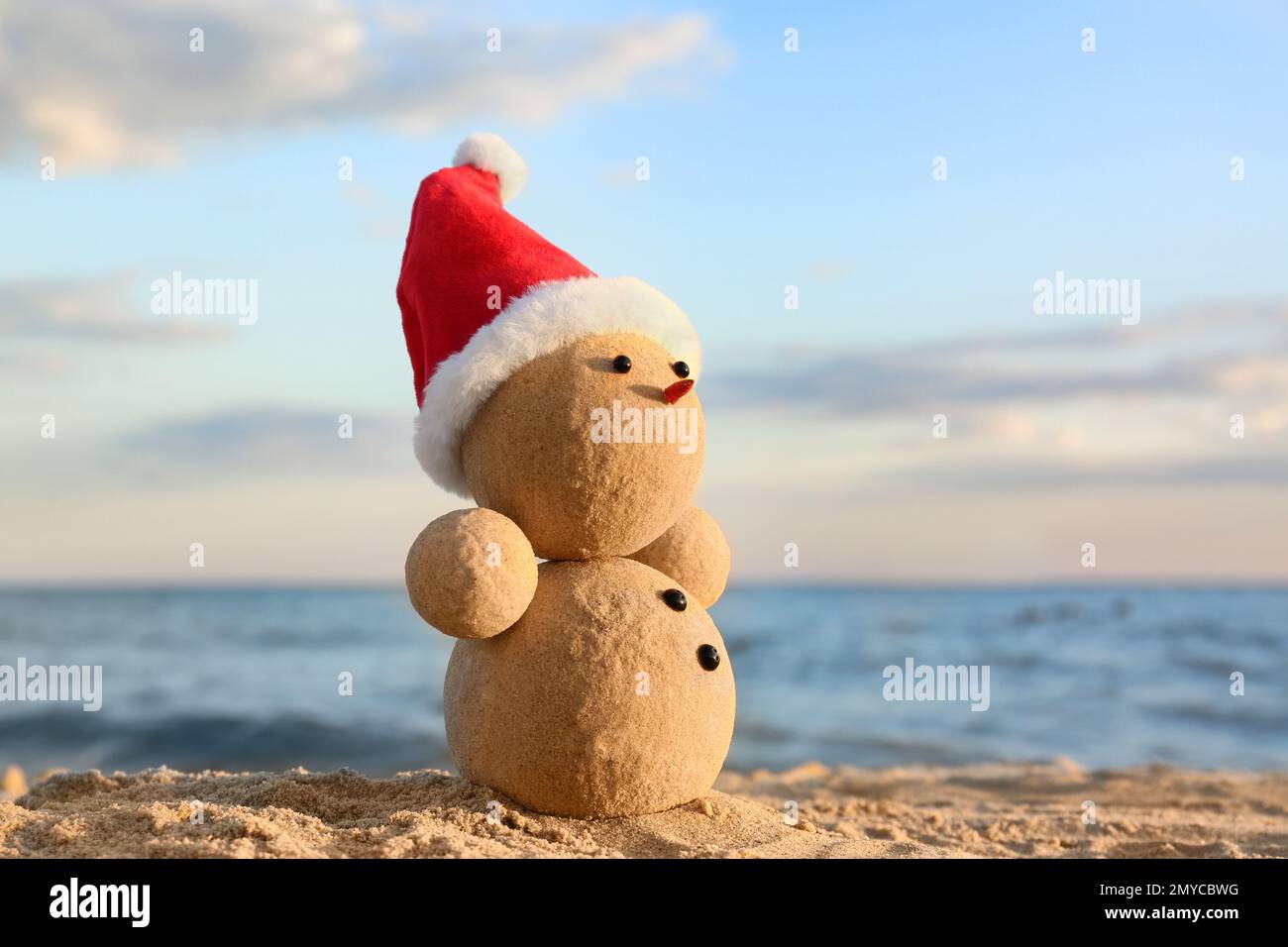 Snowman made sand on beach hi-res stock photography and images - Alamy