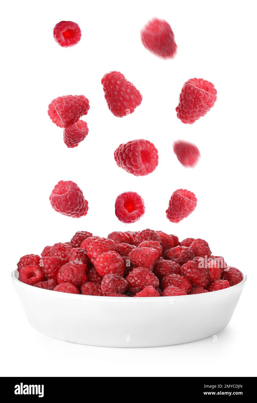 Fresh ripe raspberries flying hi-res stock photography and images - Alamy
