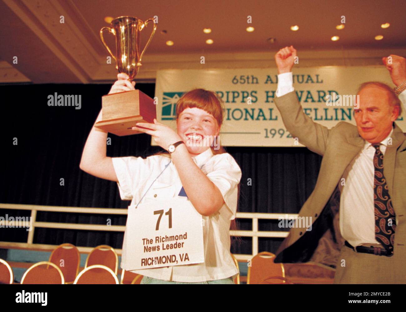 Amanda Goad, 13, of Richmond, Va., holds up her trophy after spelling ...
