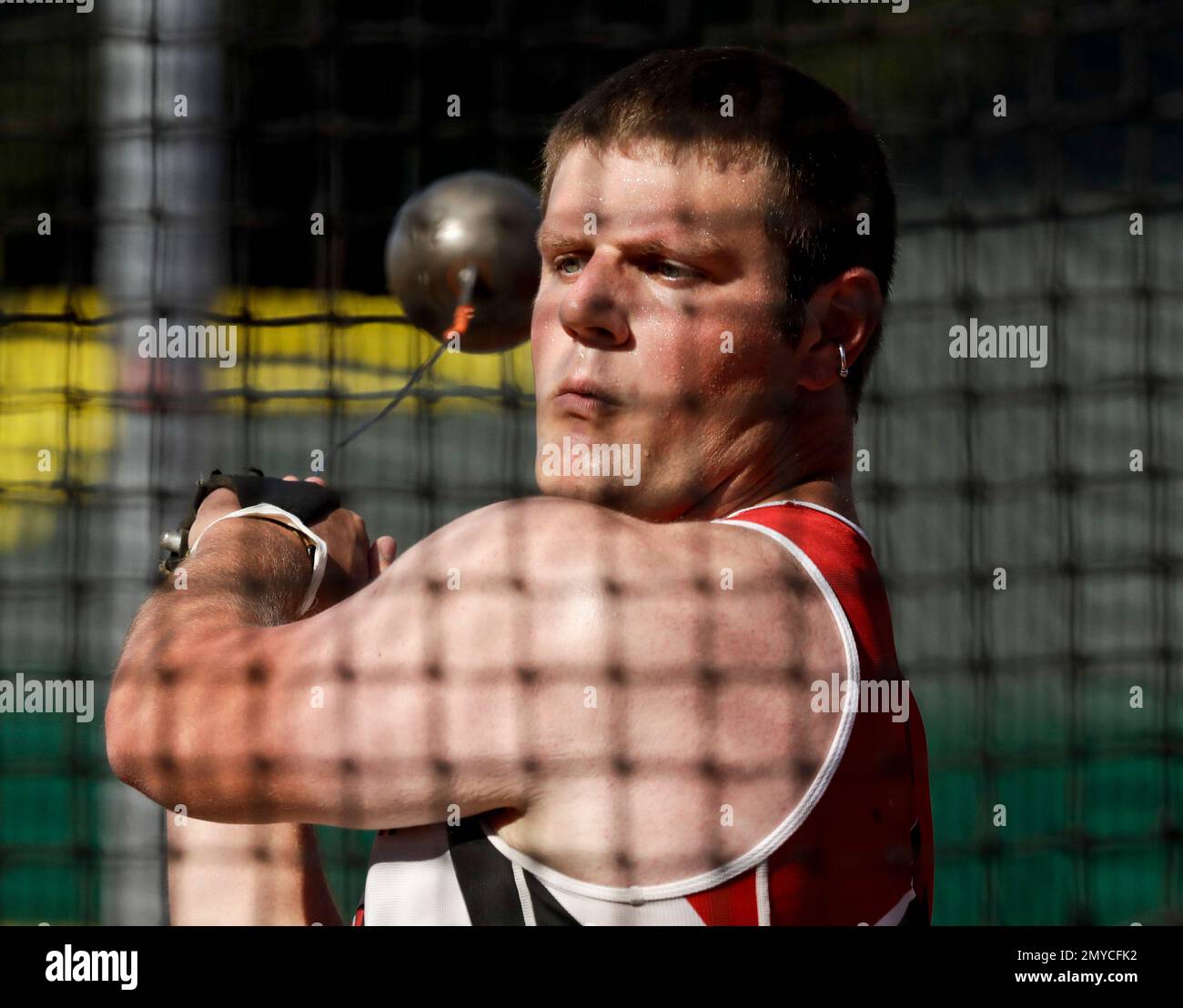 Conner Neu competes during qualifying for men's hammer throw at the U.S ...