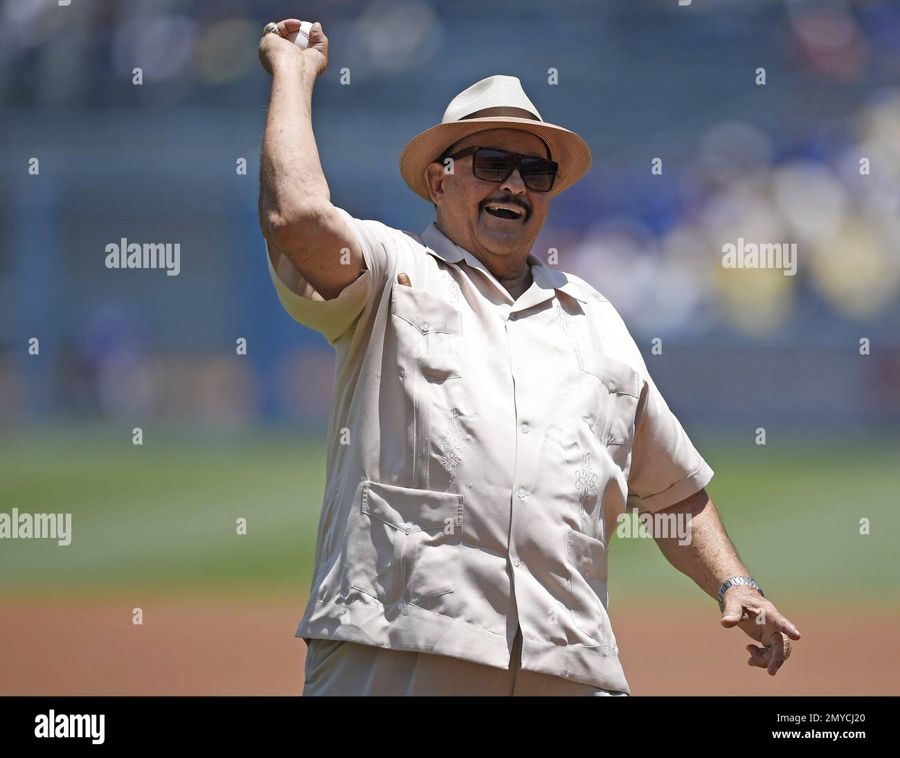 Los Angeles Dodgers scout Mike Brito throws out the first pitch prior ...