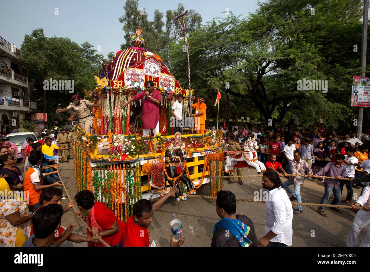 Hindu devotees pull a chariot during the annual Rath Yatra festival in ...