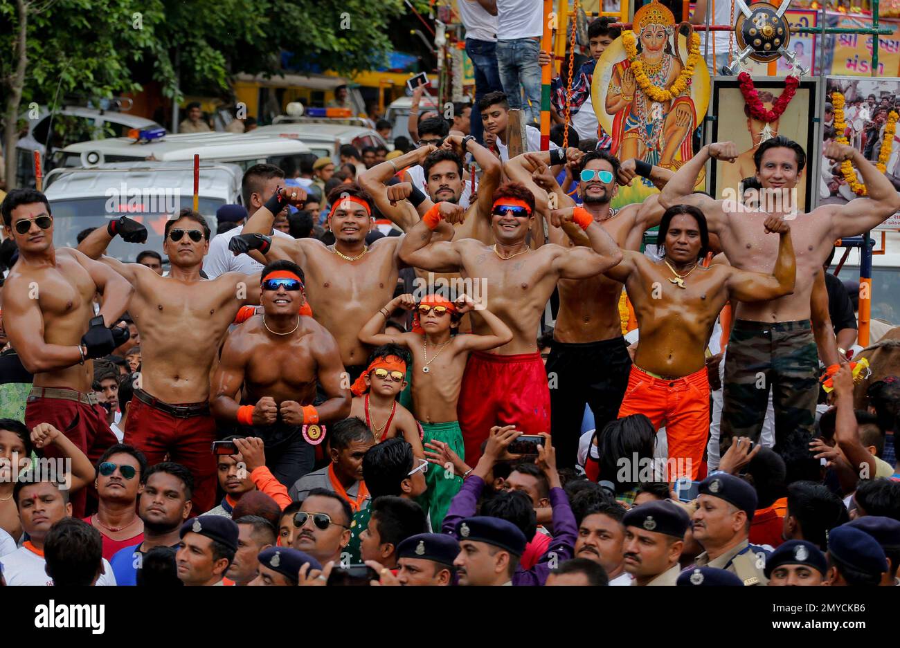 Indians display their muscles during the annual festival of Rath Yatra ...