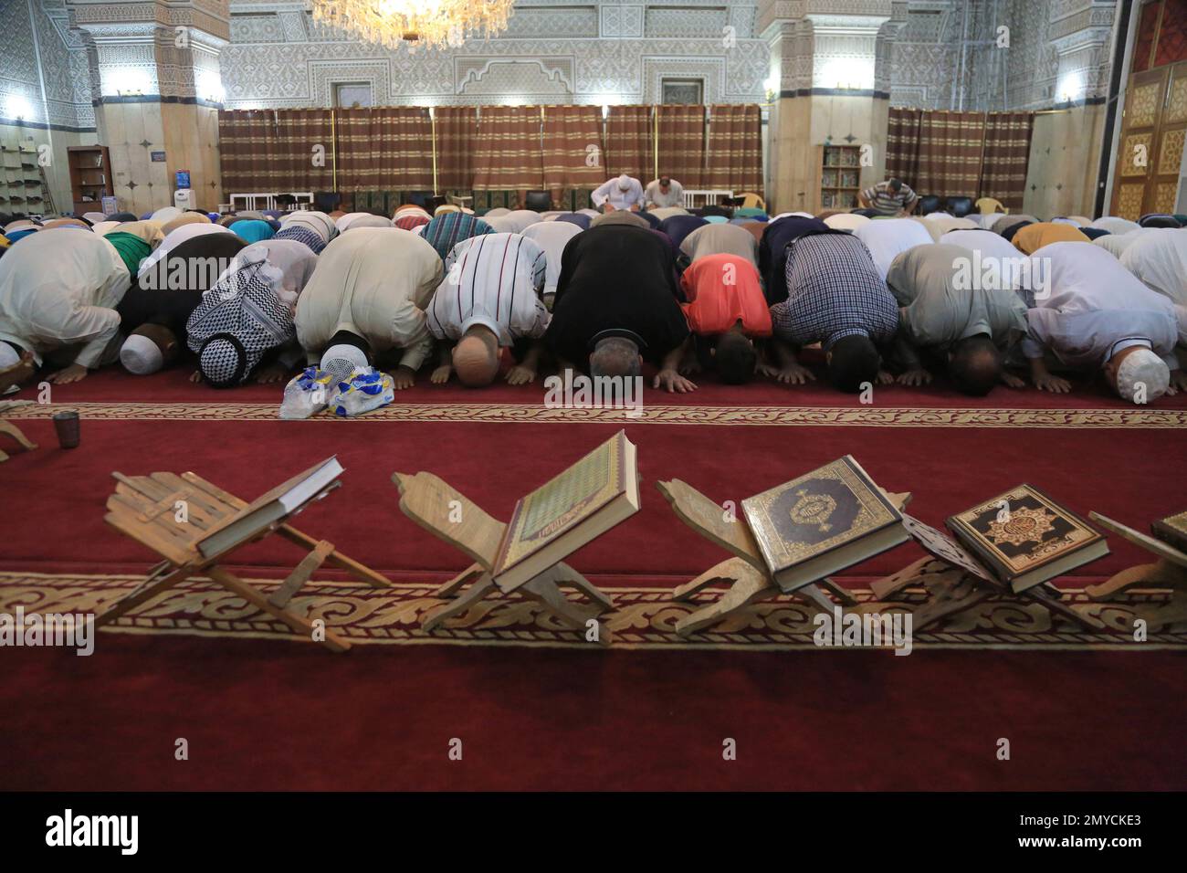 Iraqi Sunni Muslims pray on the first day of Eid al-Fitr prayers in ...