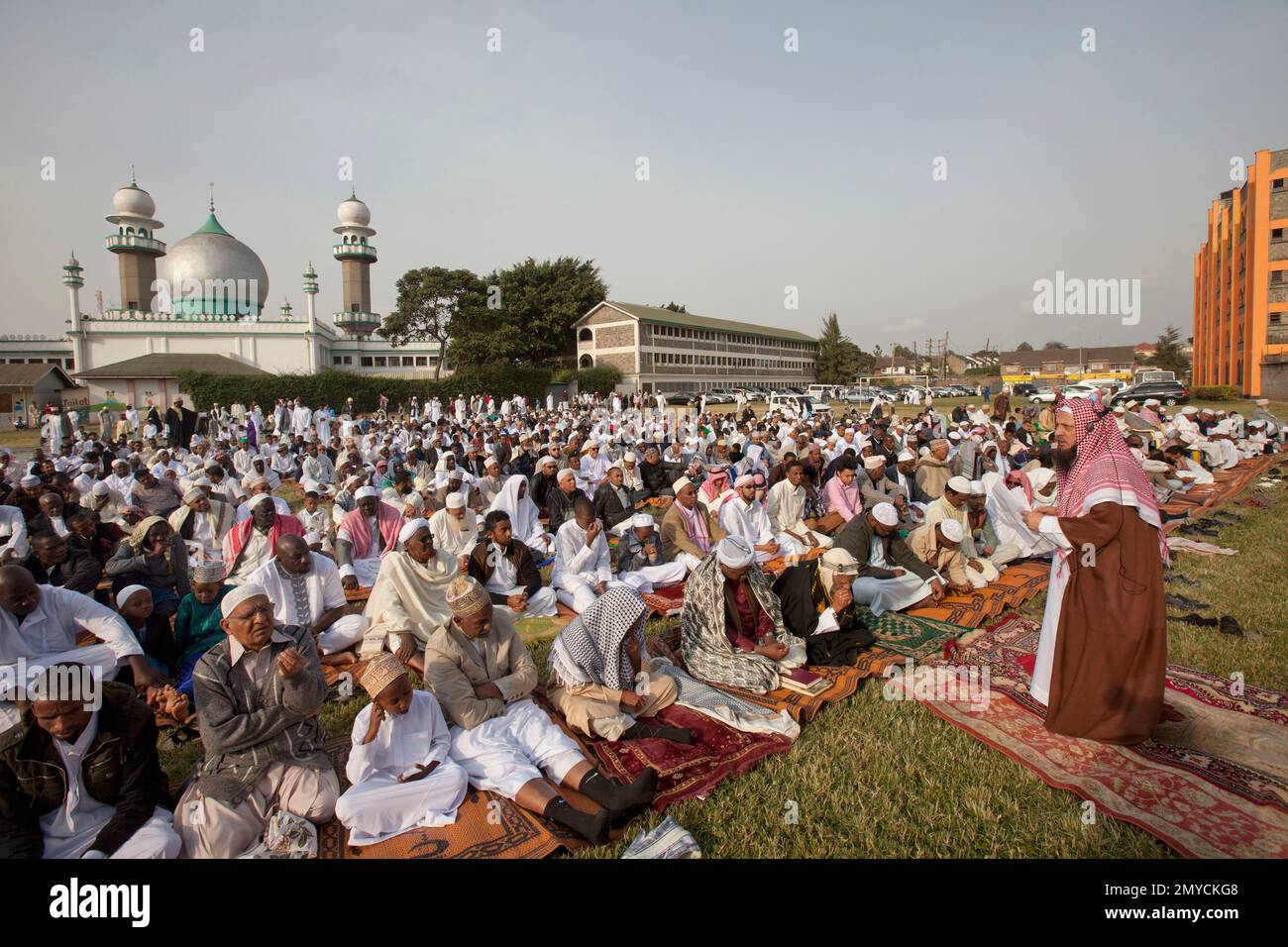 Kenyan Muslims listen to sermon from the imam during the Eid al-Fitr ...