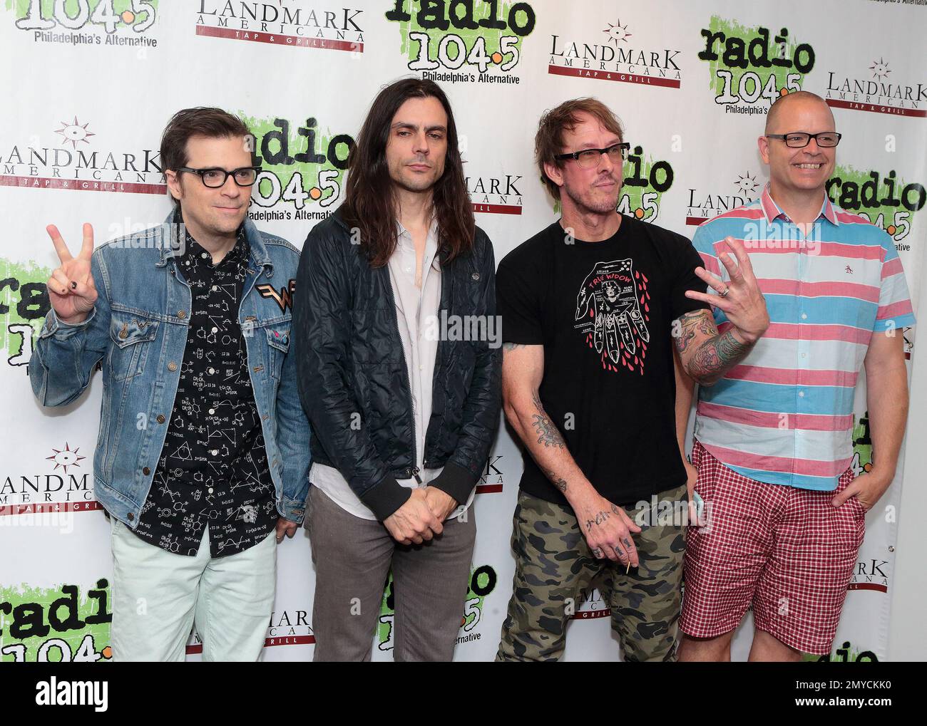 Rivers Cuomo, from left, Brian Bell, Scott Shriner and Patrick Wilson of the band Weezer visit ...