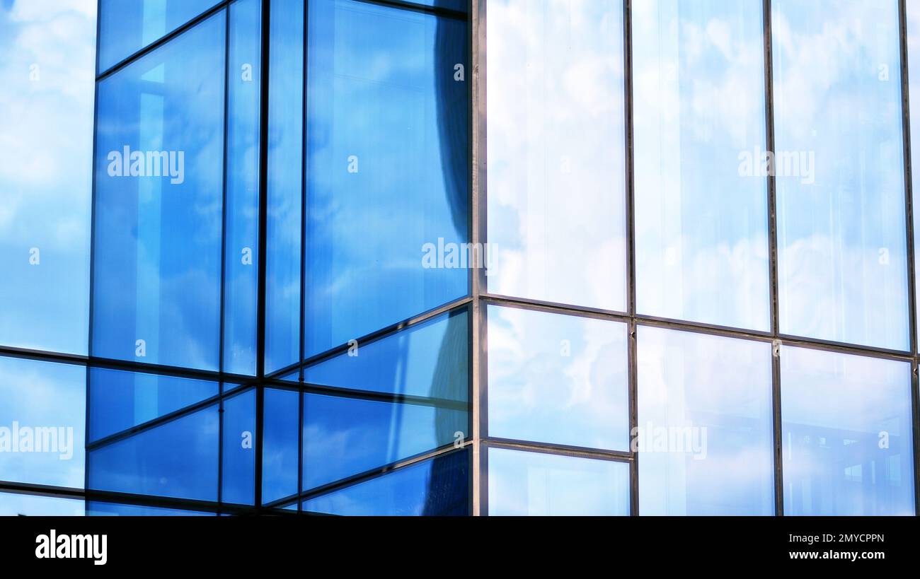 Abstract fragment of contemporary architecture, walls made of glass and ...