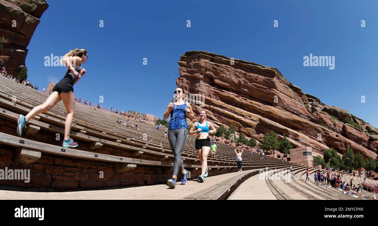 In this May 29, 2016 photo, workout enthusiasts carry out their routine ...