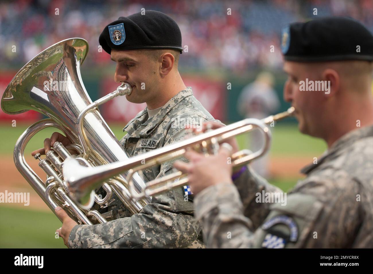 Members of the Seventy-Eighth Army Band plays during the seventh inning ...