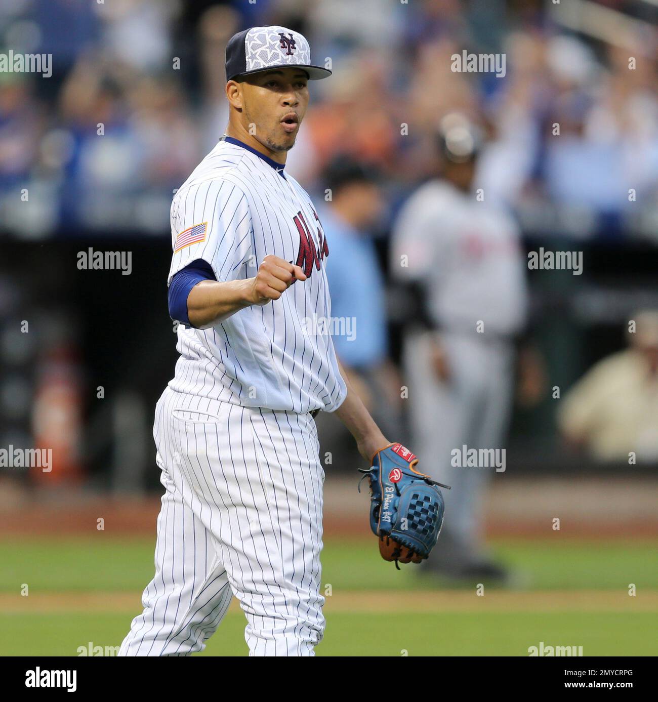 New York Mets relief pitcher Hansel Robles reacts after his team ...