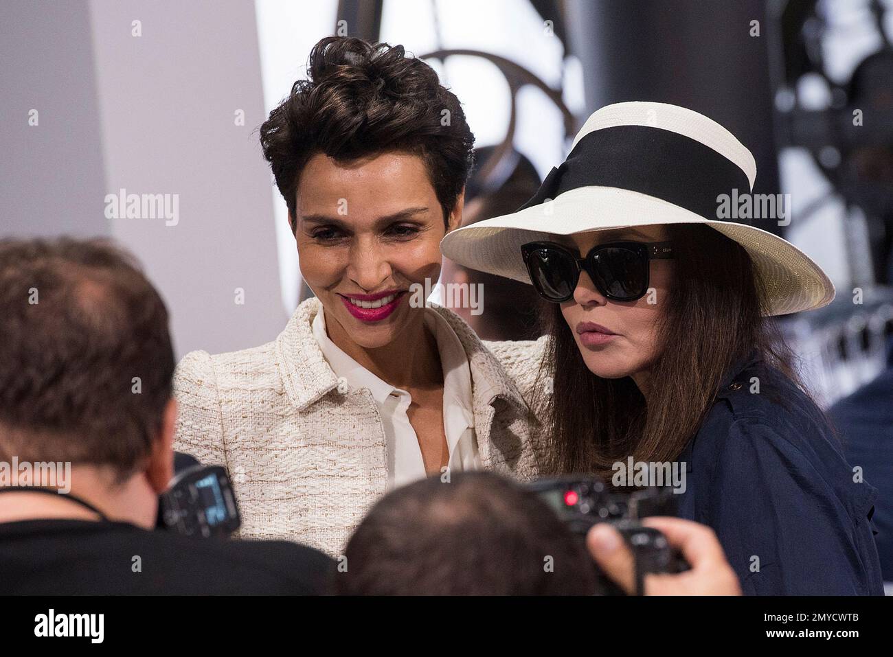 French actress Isabelle Adjani, right, poses for photographers with ...