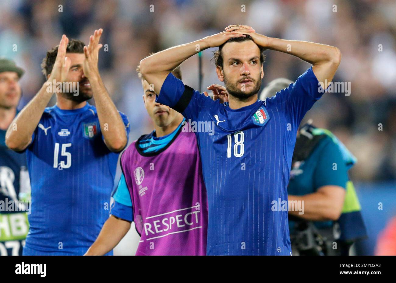 Italy's Andrea Barzagli, left, and Marco Parolo react after losing the ...