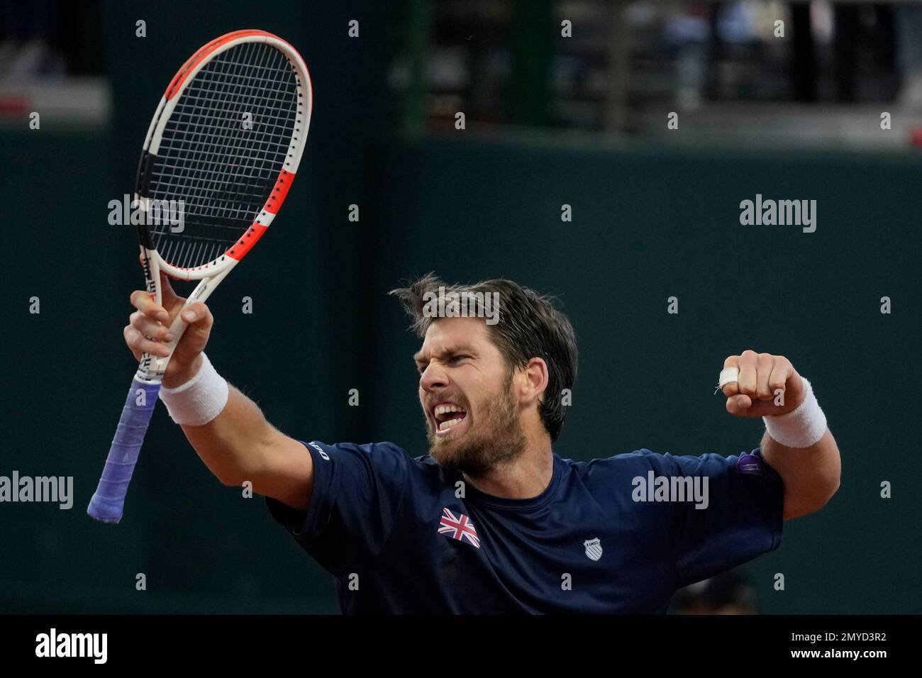 Cameron Norrie, of Britain, celebrates after defeatingColombia's ...