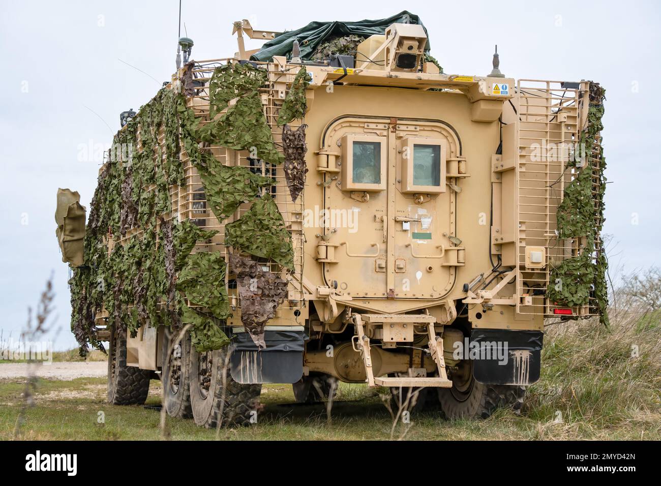 close-up of a British army Mastiff protected patrol vehicle under green ...