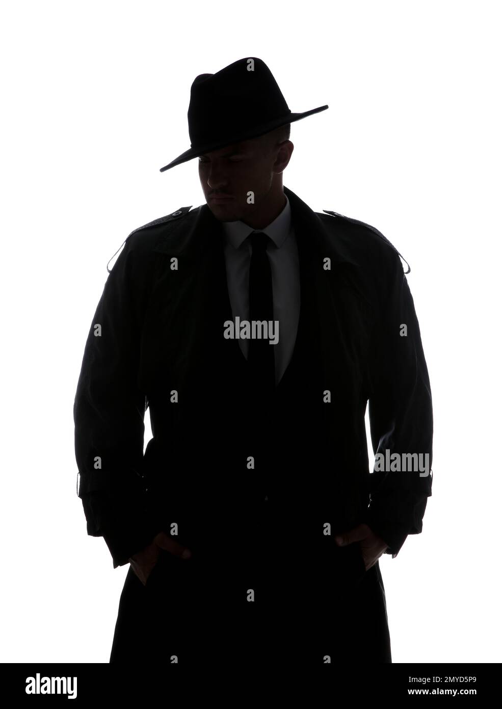 Old fashioned detective in hat on white background Stock Photo - Alamy