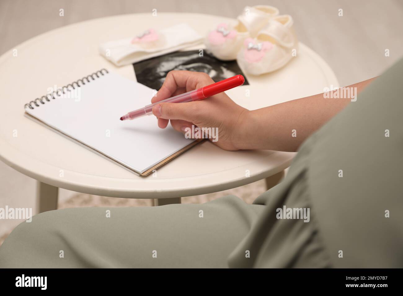 Child writing shopping list hi-res stock photography and images - Alamy