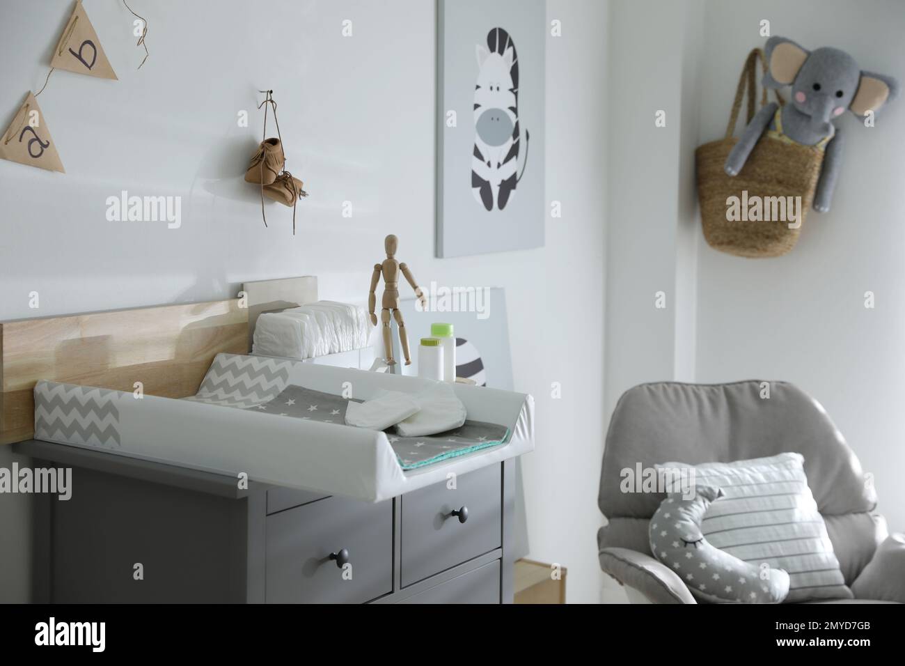 Modern changing table in baby room interior Stock Photo - Alamy