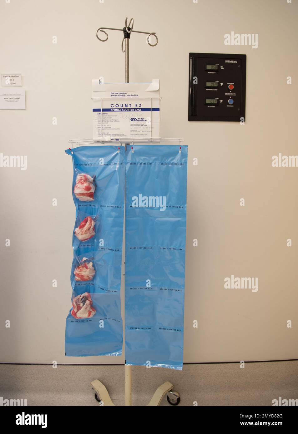 Sponge counter bag hangs inside an operating room during a kidney ...
