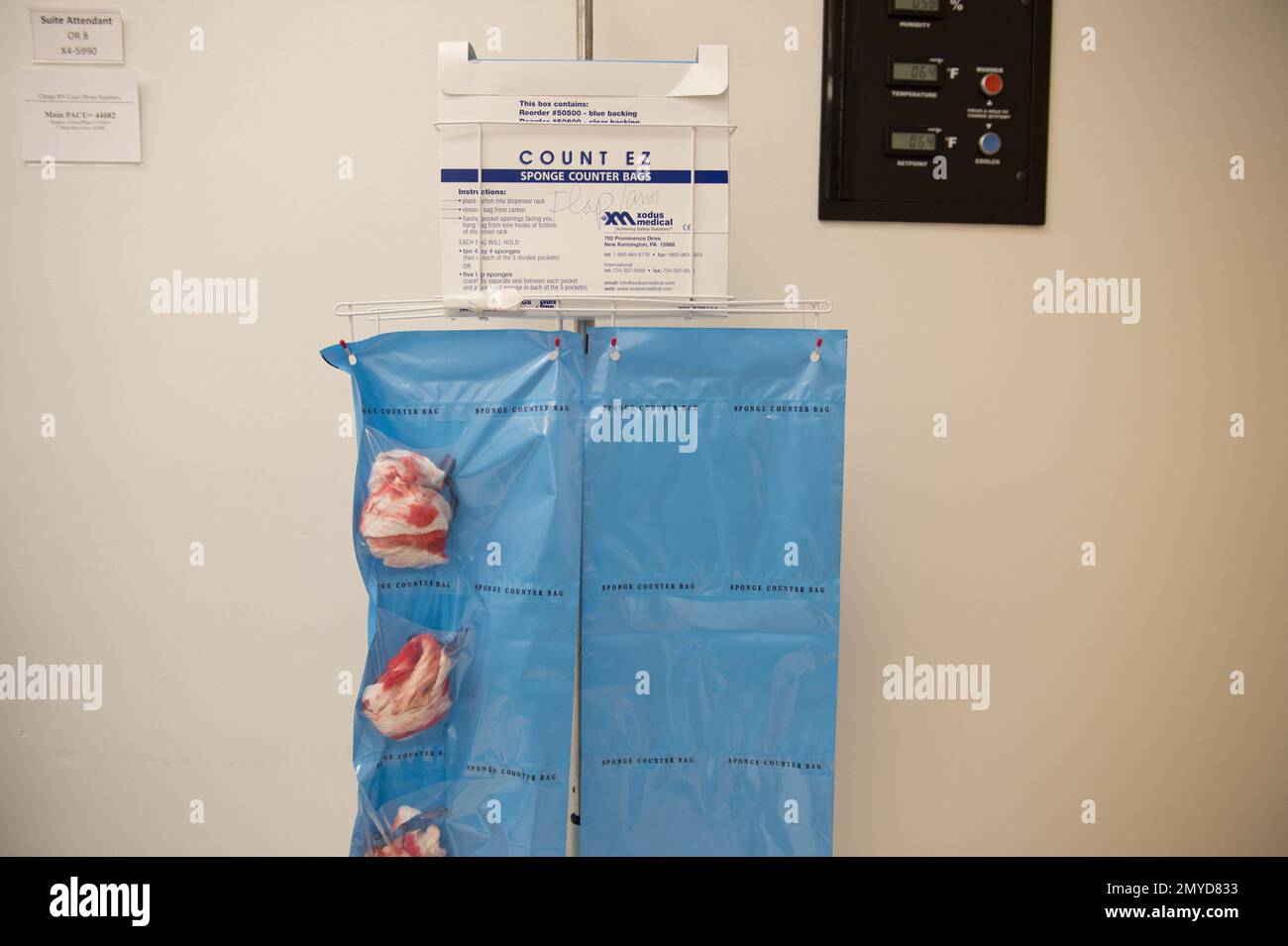 Sponge counter bag hangs inside an operating room during a kidney ...