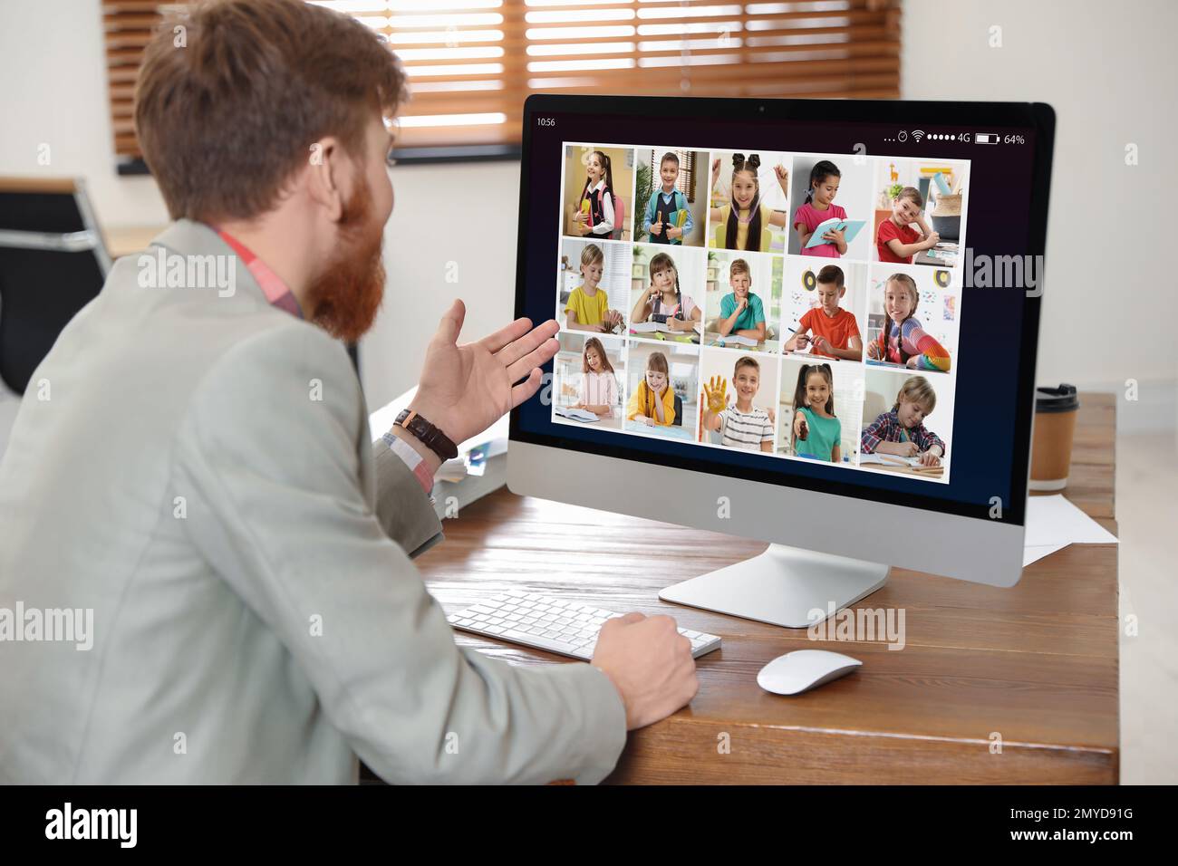 Teacher giving online school lesson during quarantine and social ...