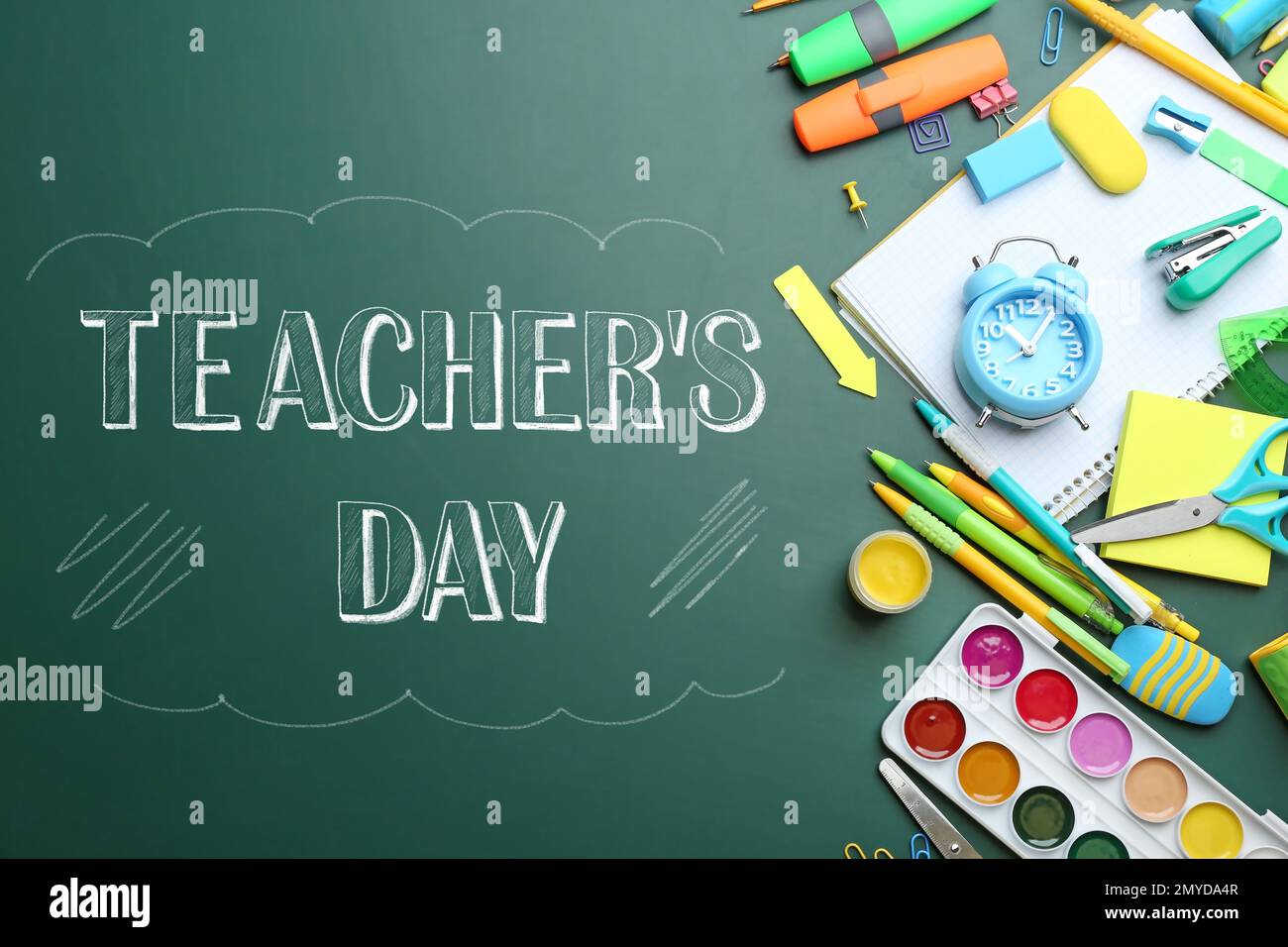 Text Teacher's Day and different school stationery on green chalkboard ...