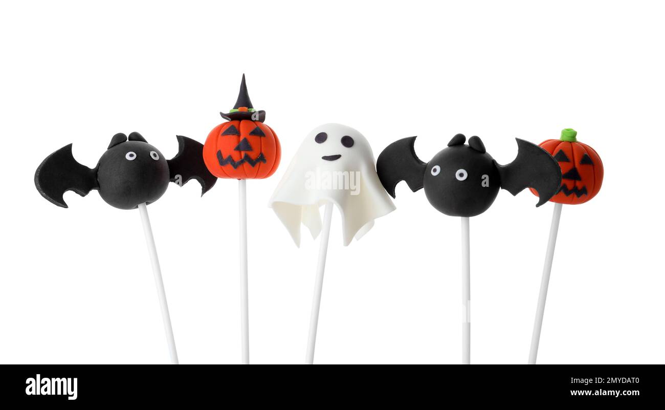Different Halloween themed cake pops on white background Stock Photo ...
